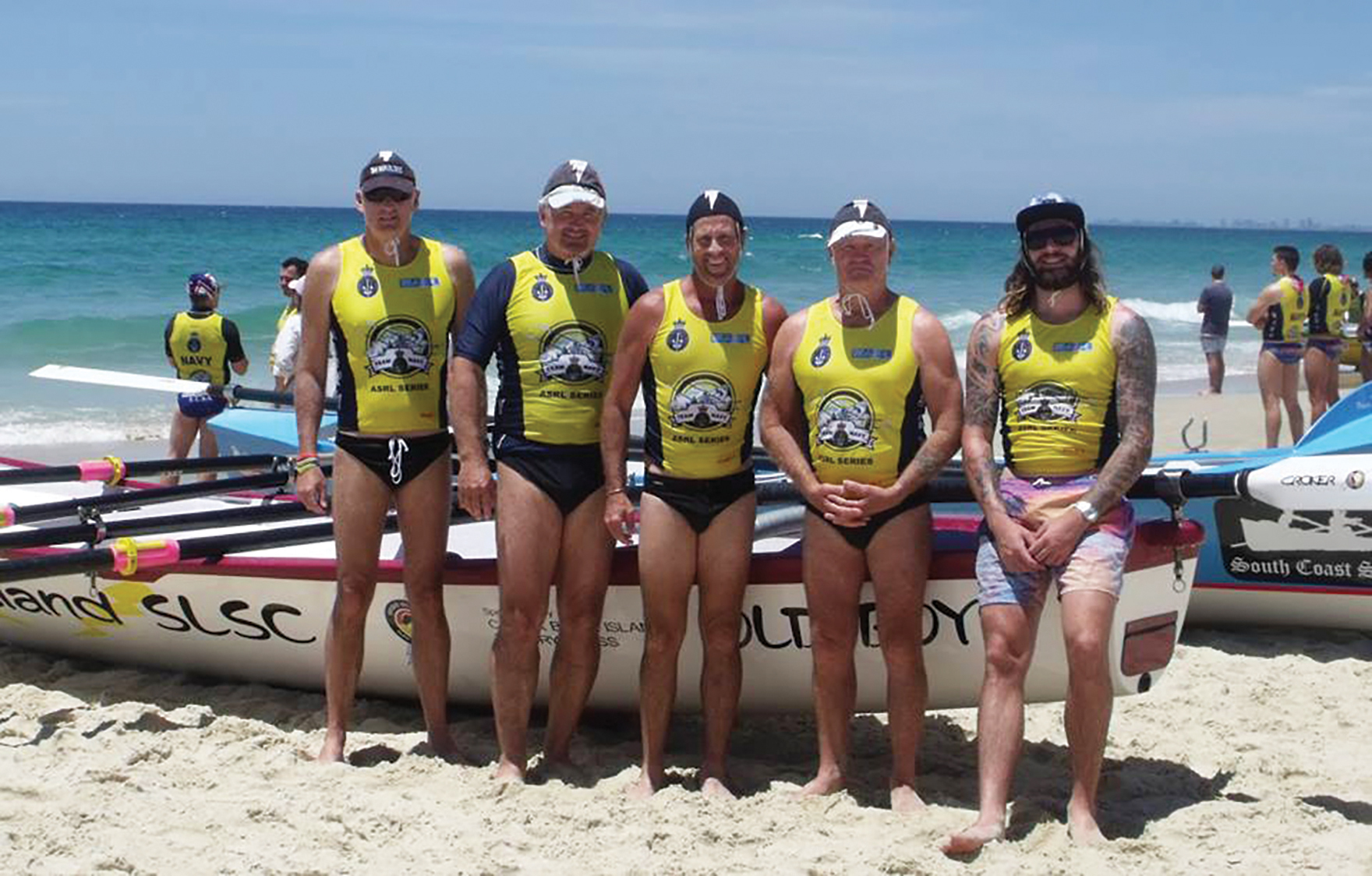 Bribie lifesavers celebrate a century of sun, sand and saving lives