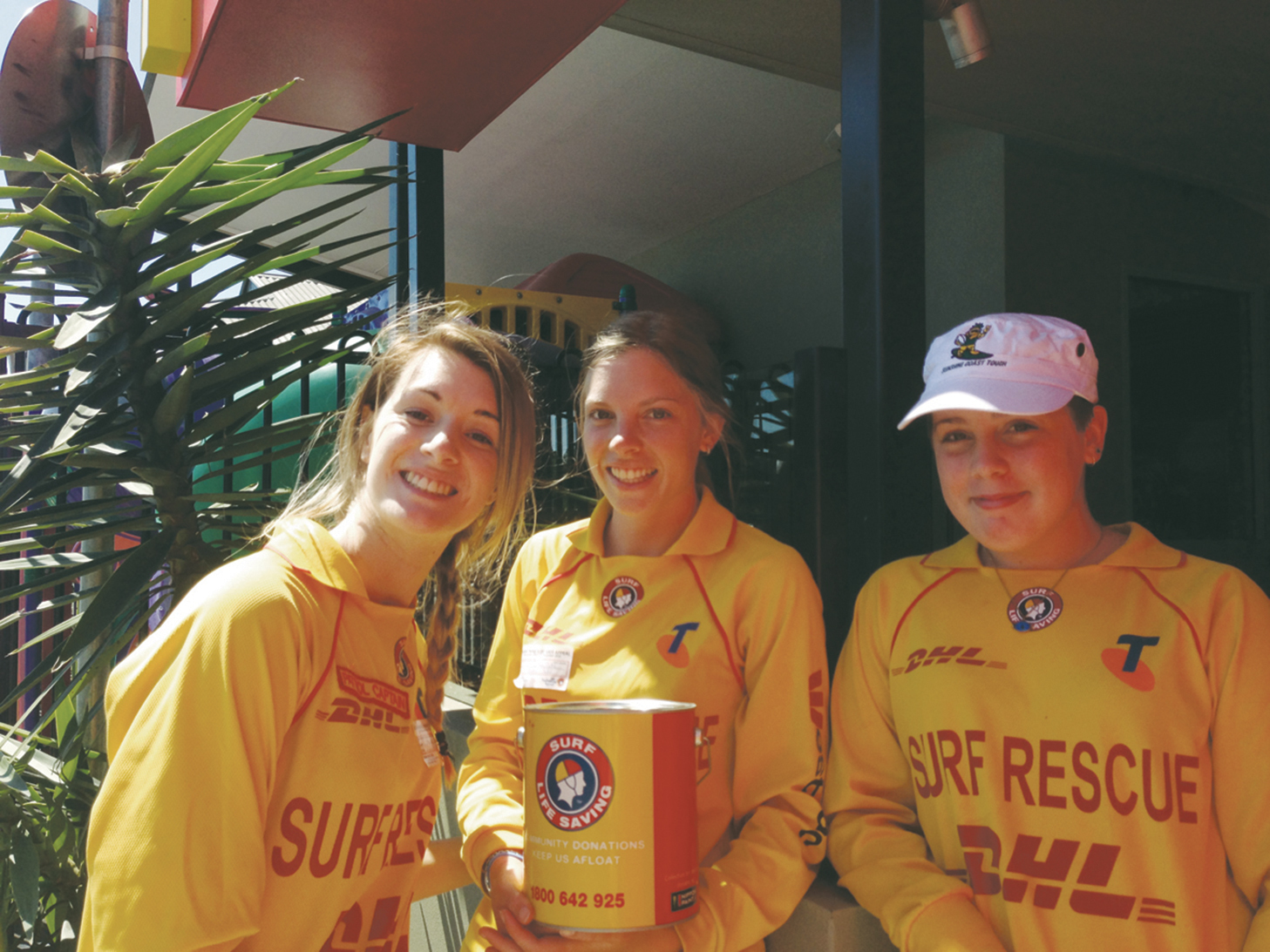 Bribie lifesavers celebrate a century of sun, sand and saving lives