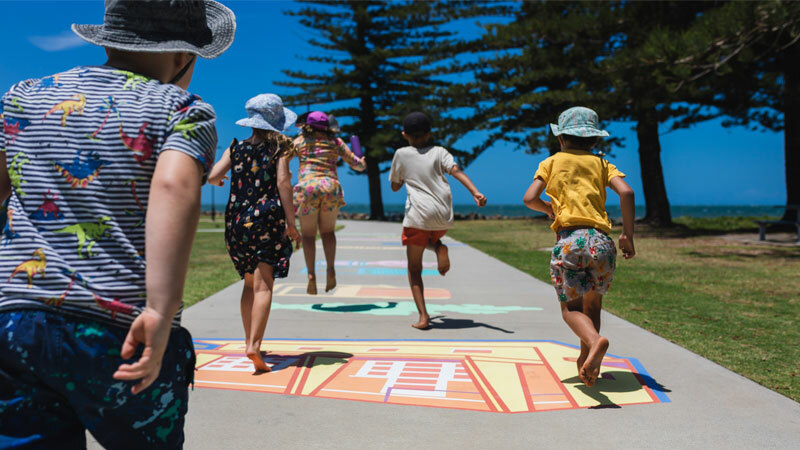 Vinyl artworks brighten up local footpaths